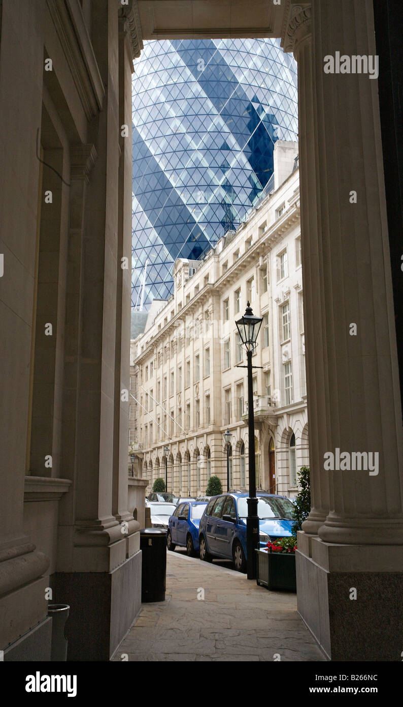 Swiss Re building seen through adjacent building entrance Stock Photo ...