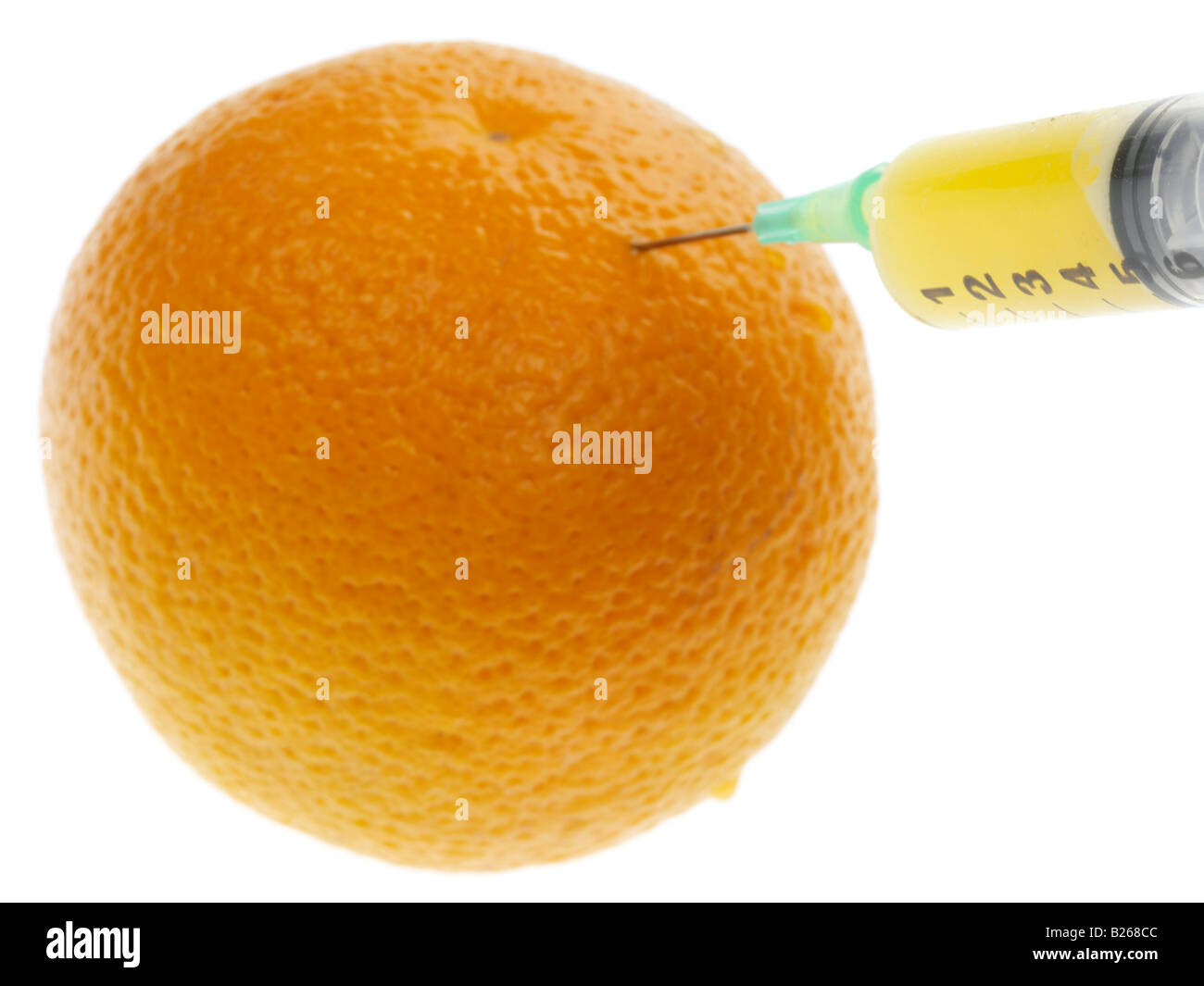 Injecting an Orange Stock Photo - Alamy