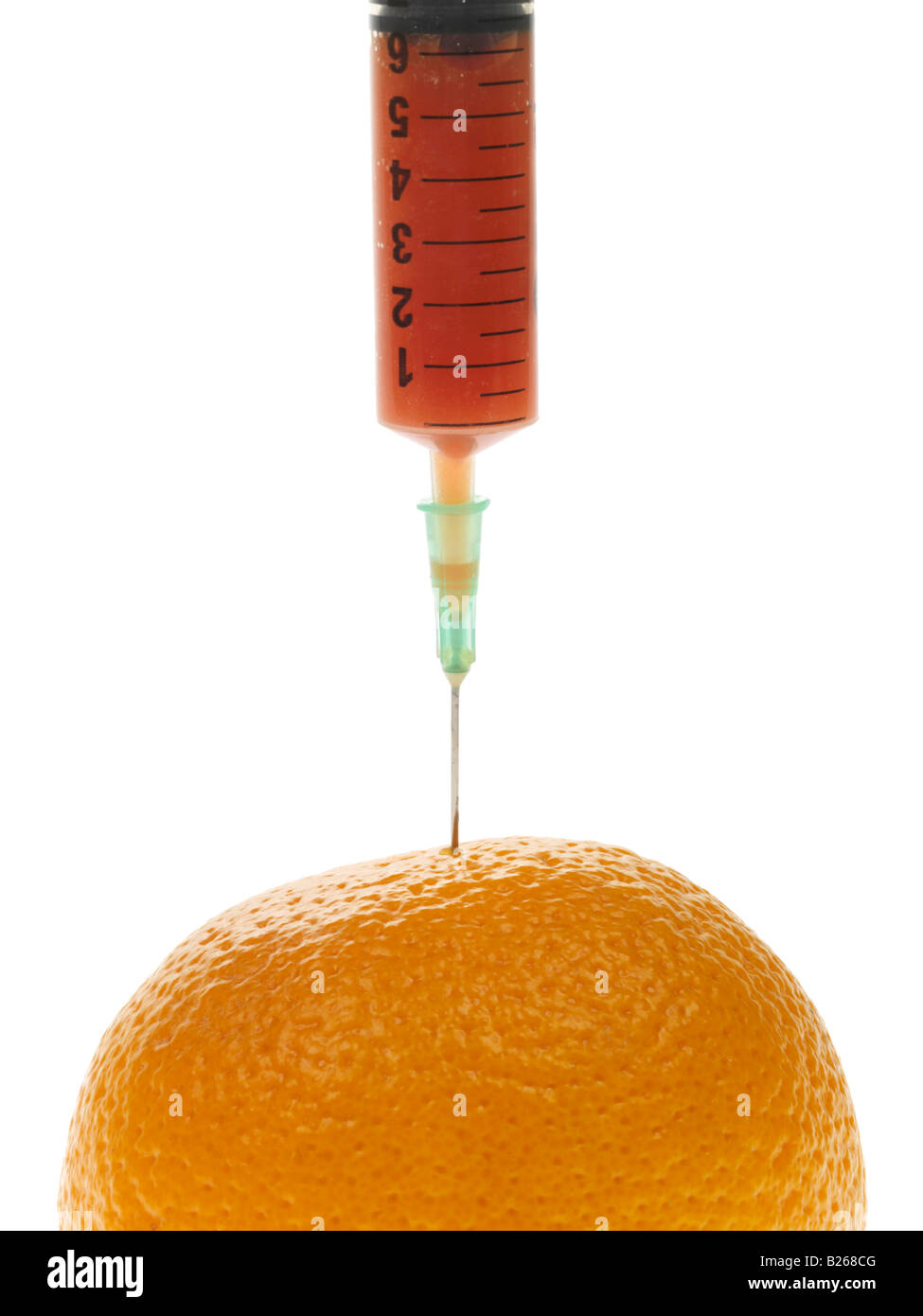 Injecting an Orange Stock Photo - Alamy