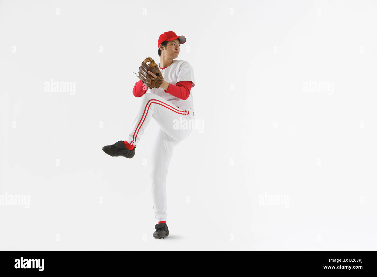 Pitcher throwing baseball hi-res stock photography and images - Alamy