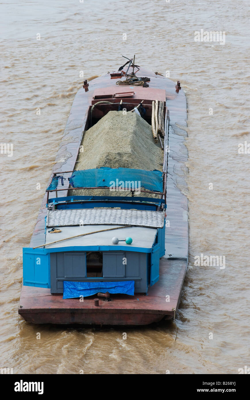 Rear view of small cargo vessel Stock Photo - Alamy
