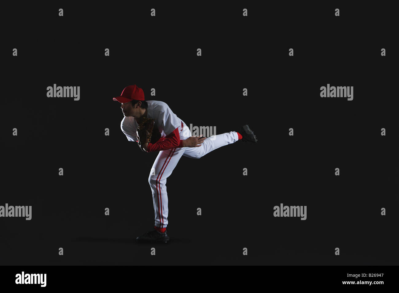 Pitcher Throwing Baseball Stock Photo - Alamy