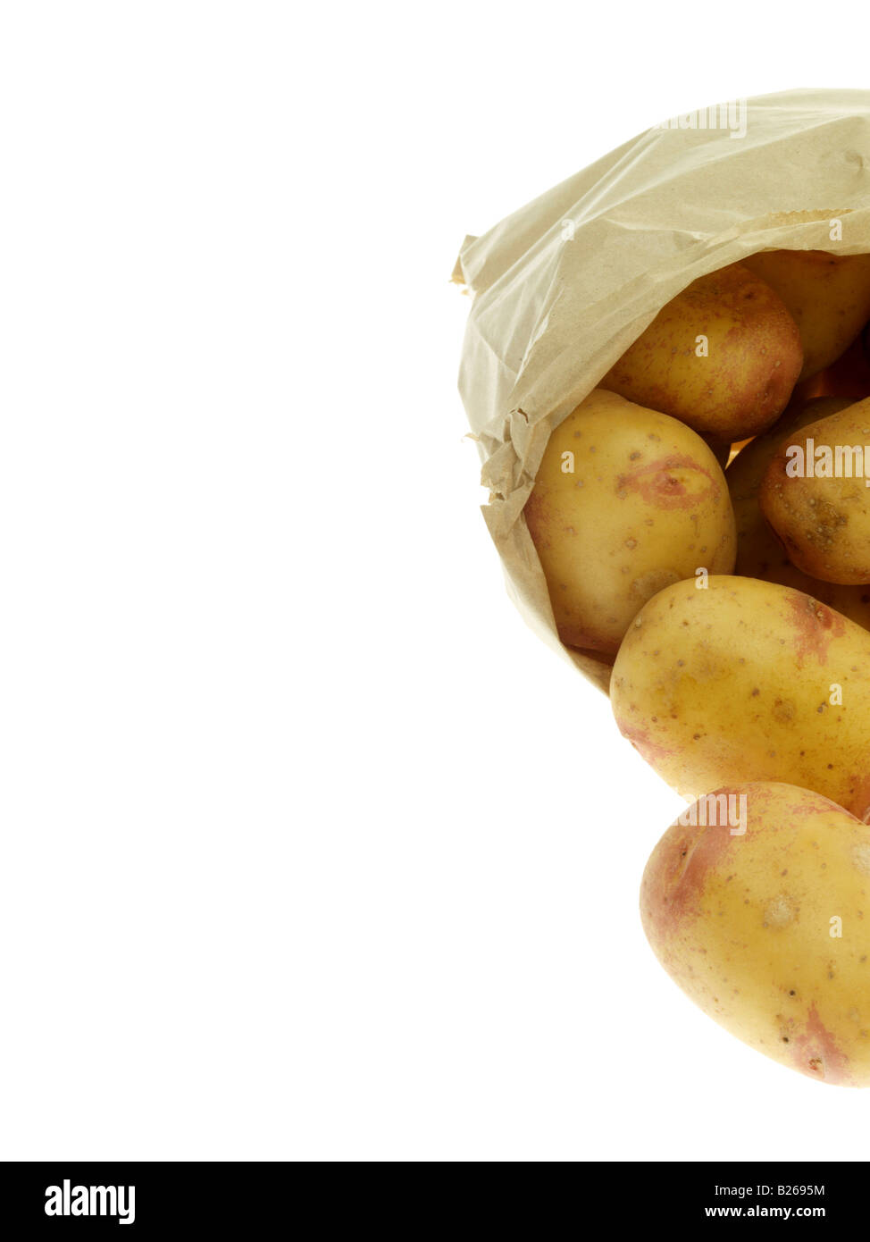 Brown Paper Bag Of Fresh White Whole Uncooked Potatoes With No People ...