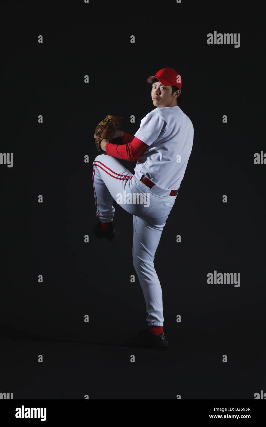 Pitcher Throwing Baseball Stock Photo: 18578611 - Alamy