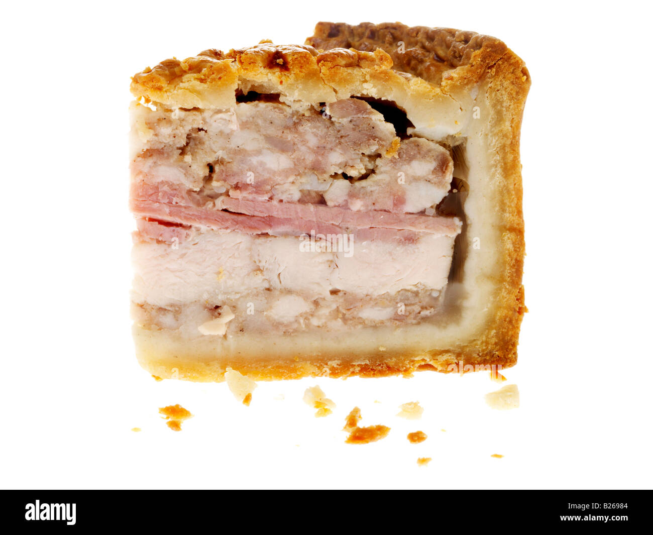 Fresh Slice Of Layered Pork Chicken and Ham Pie In Golden Crusty Pastry ...