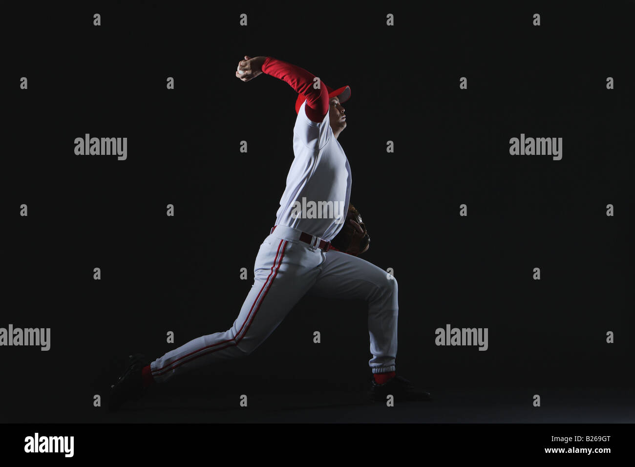 Pitcher Throwing Baseball Stock Photo - Alamy