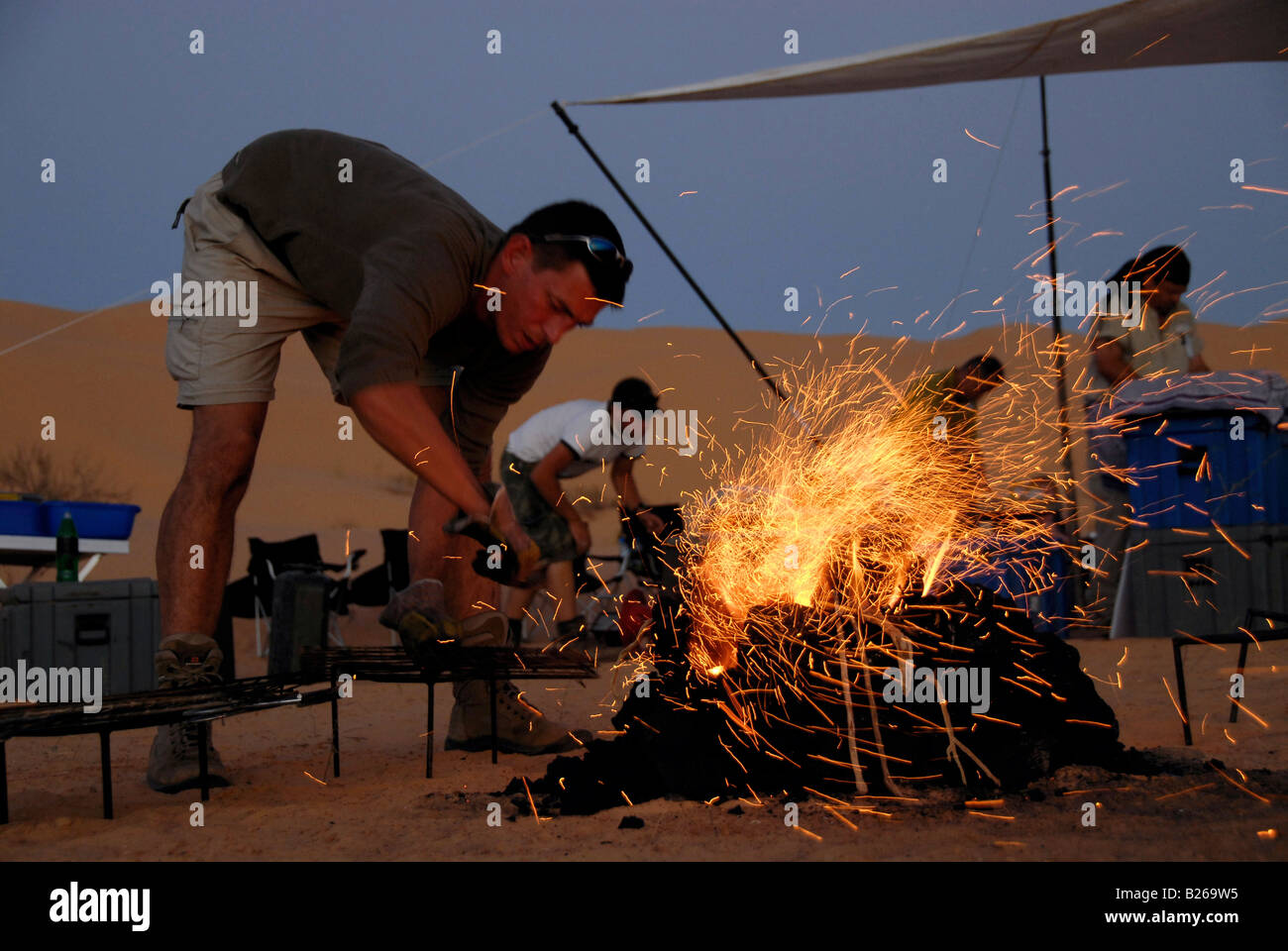 Man lighting camp fire, Offroad 4x4 Sahara Desert Tour, Bebel Tembain ...