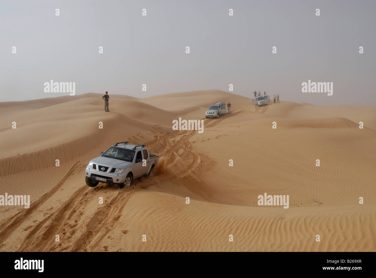 4x4 vehicle, jeep driving over sand dunes in the desert, Offroad 4x4 ...