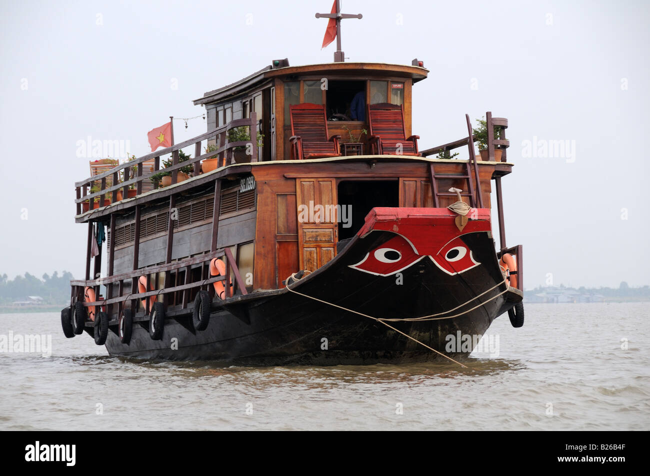 Traditional wooden Vietnamese river boat Mekong river Vietnam Stock ...