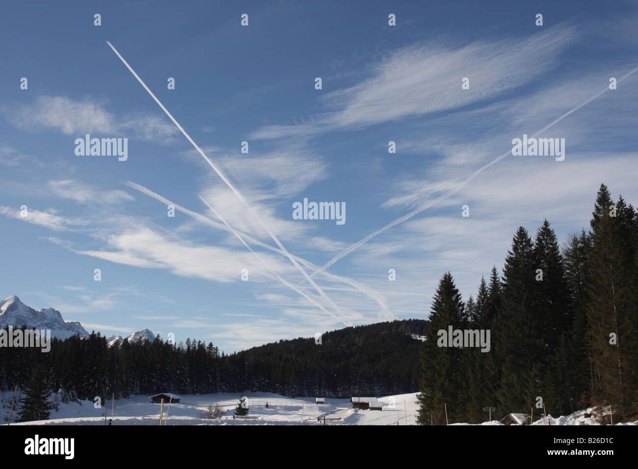 Streaky clouds in a blue winter sky Stock Photo - Alamy