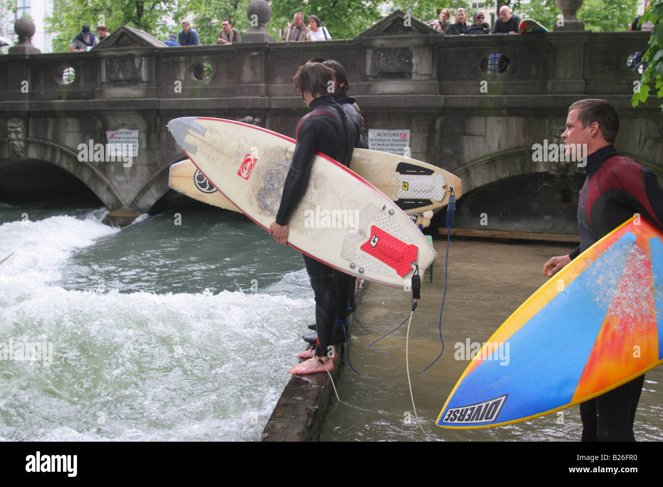 Surfing on a river wave, in city of Munich, Germany Stock Photo - Alamy