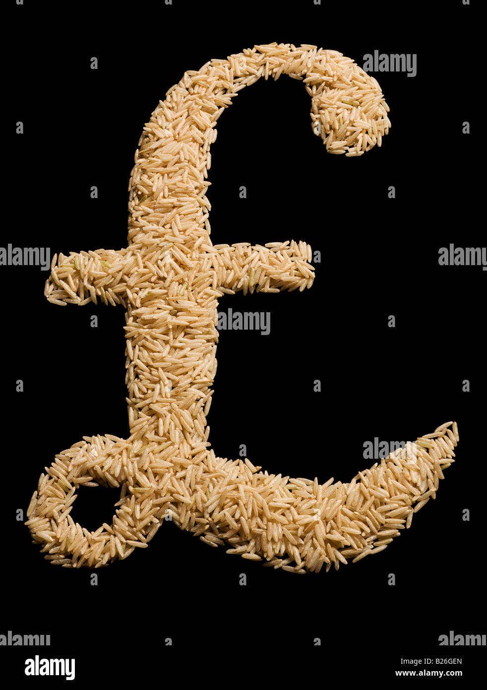 Pound Stirling symbol made from rice Stock Photo - Alamy