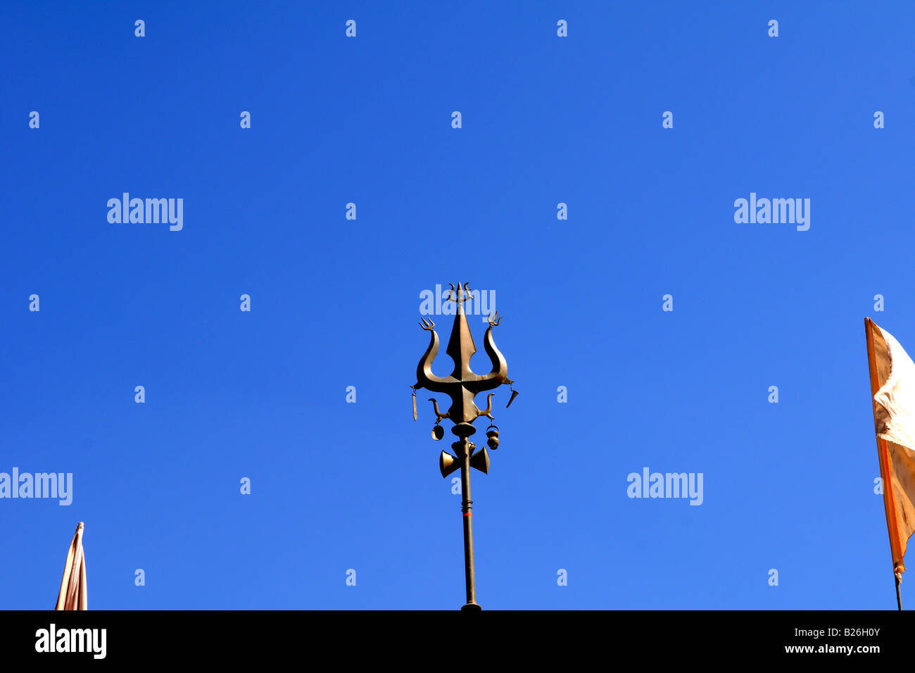 Shiva's Trident stands on a Hindu temple, India Stock Photo - Alamy