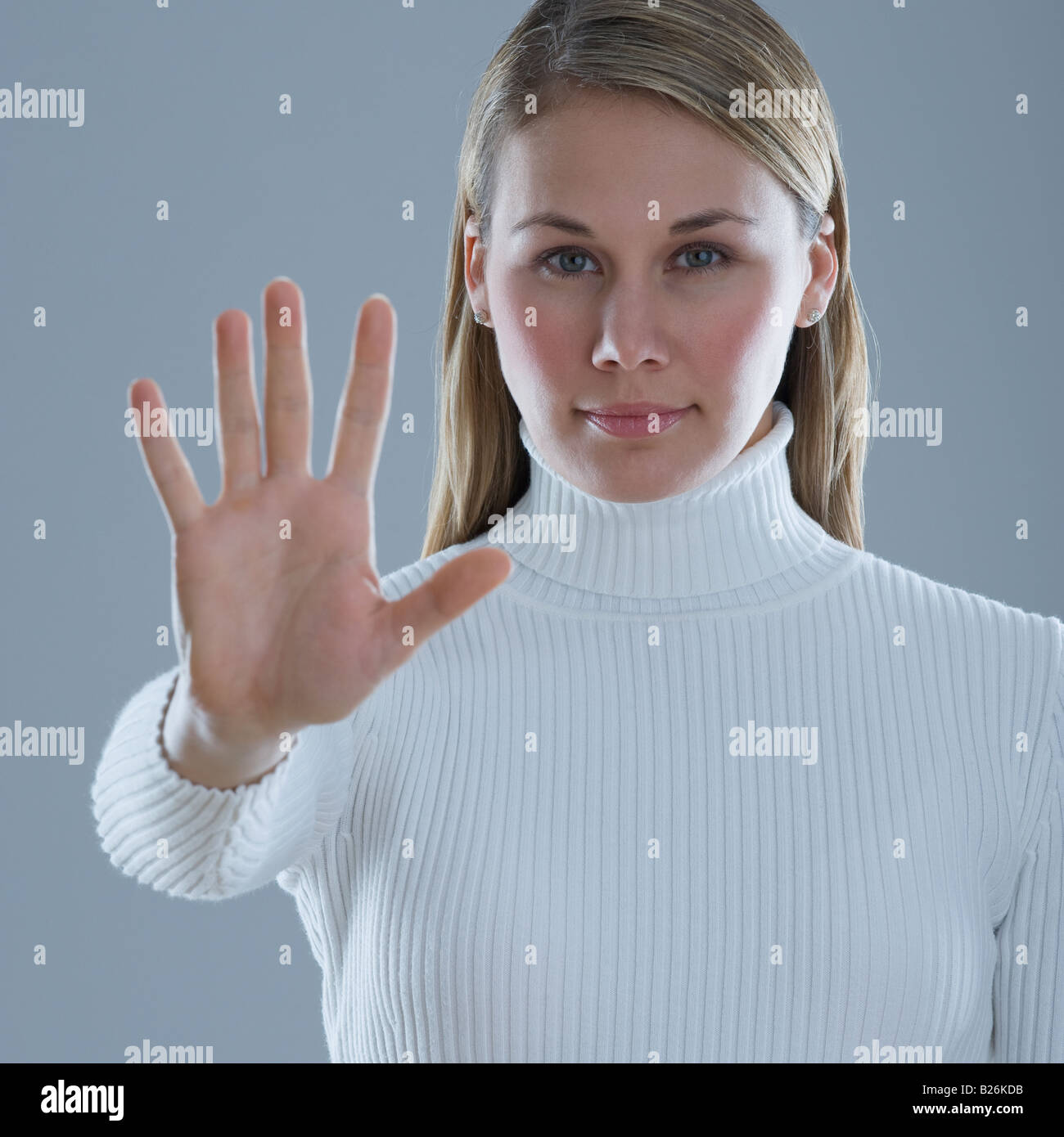 Hand blocking camera woman hi-res stock photography and images - Alamy