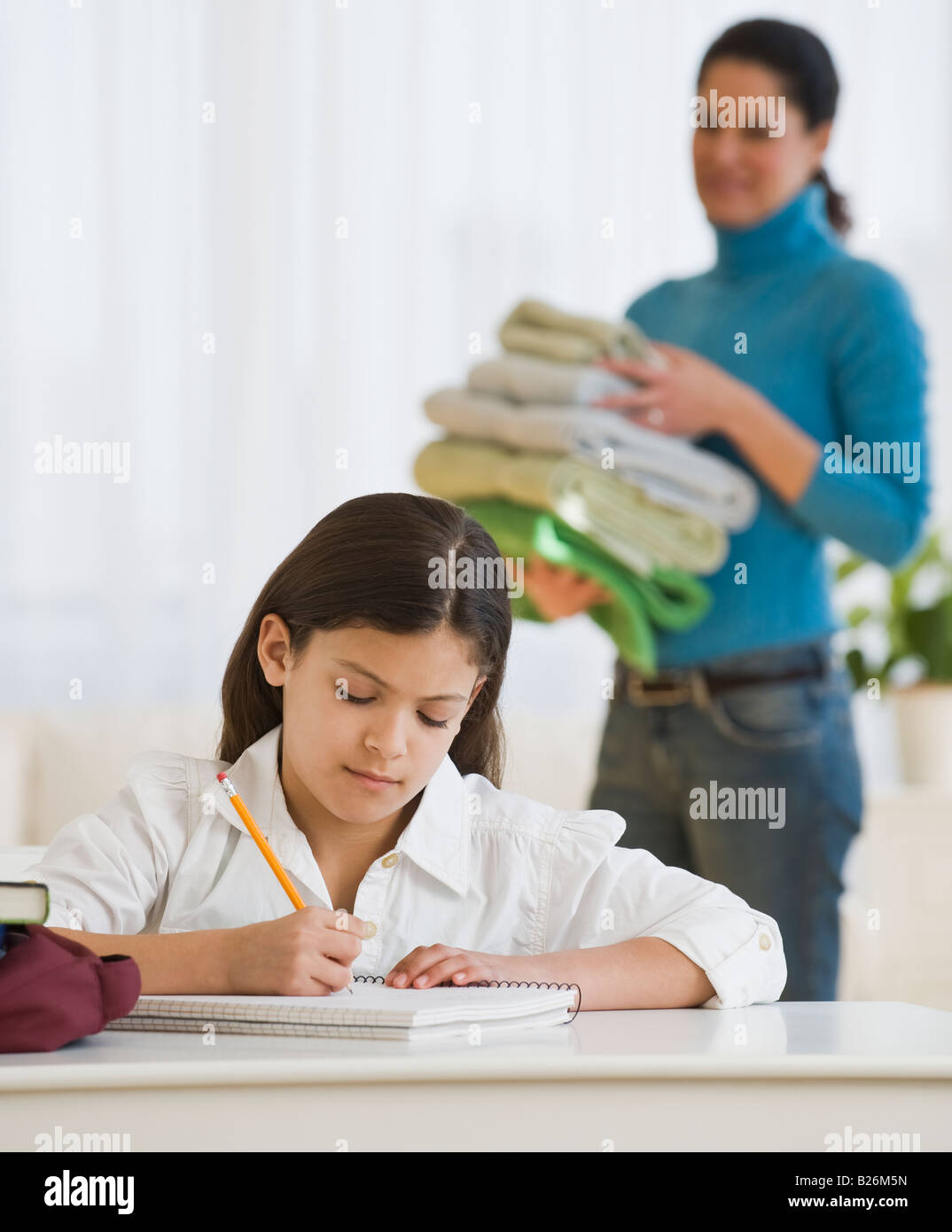 Girl doing homework stack hi-res stock photography and images - Alamy
