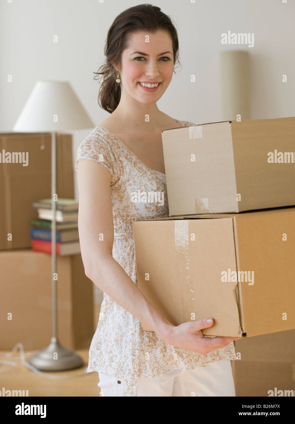 Carrying moving boxes hi-res stock photography and images - Alamy
