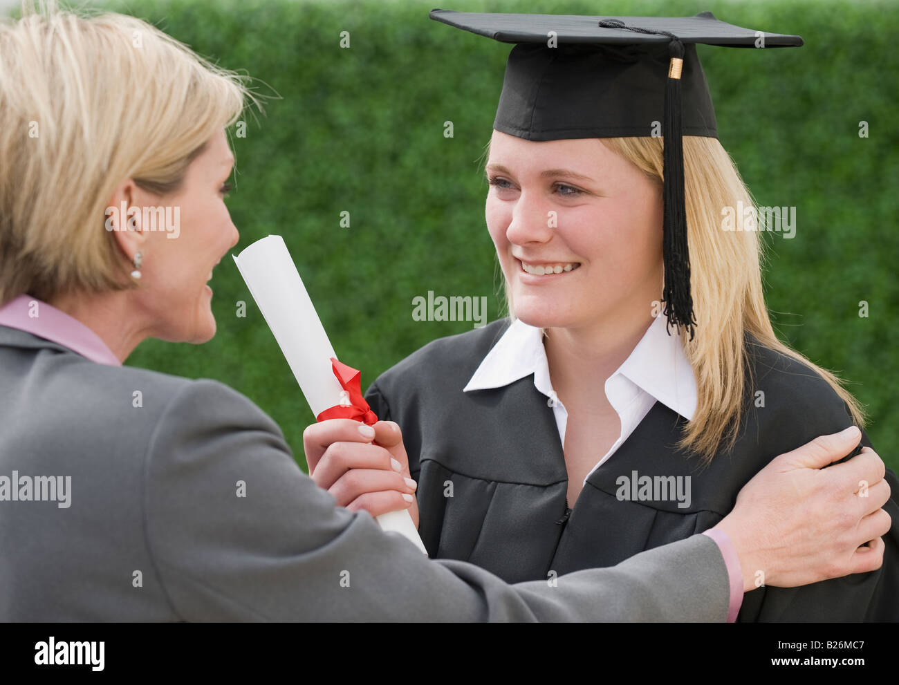 Mother with child at graduation ceremony hi-res stock photography and ...