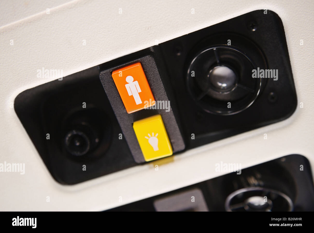 Close up of airplane call button Stock Photo - Alamy