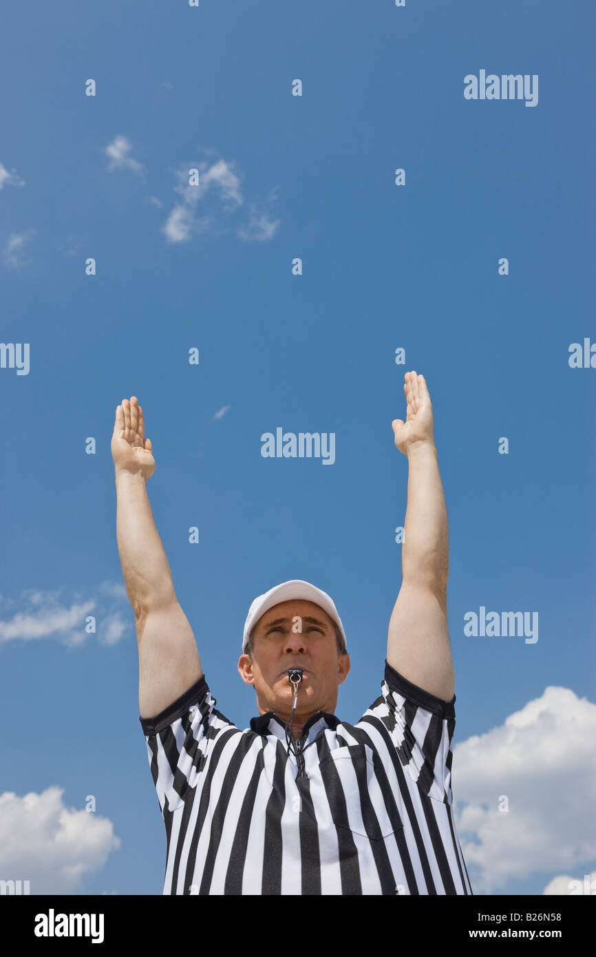 Male football referee making touchdown call Stock Photo - Alamy