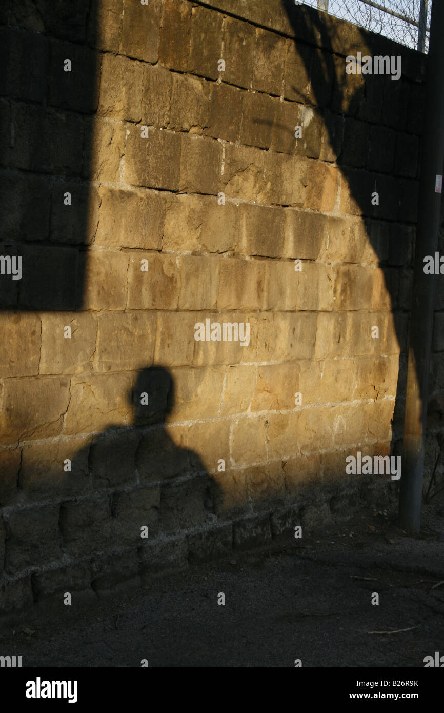 Mans shadow on wall hi-res stock photography and images - Alamy