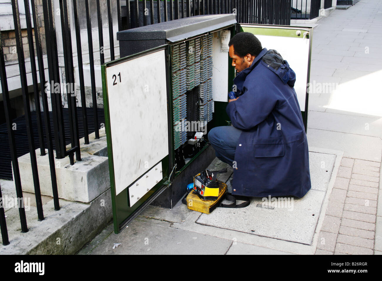 African american man working on the street Stock Photo - Alamy