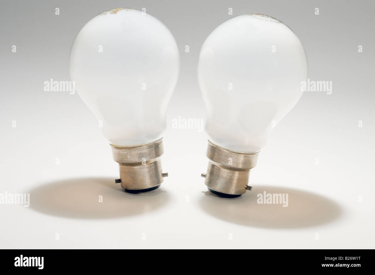 Two electric lightbulbs Stock Photo - Alamy
