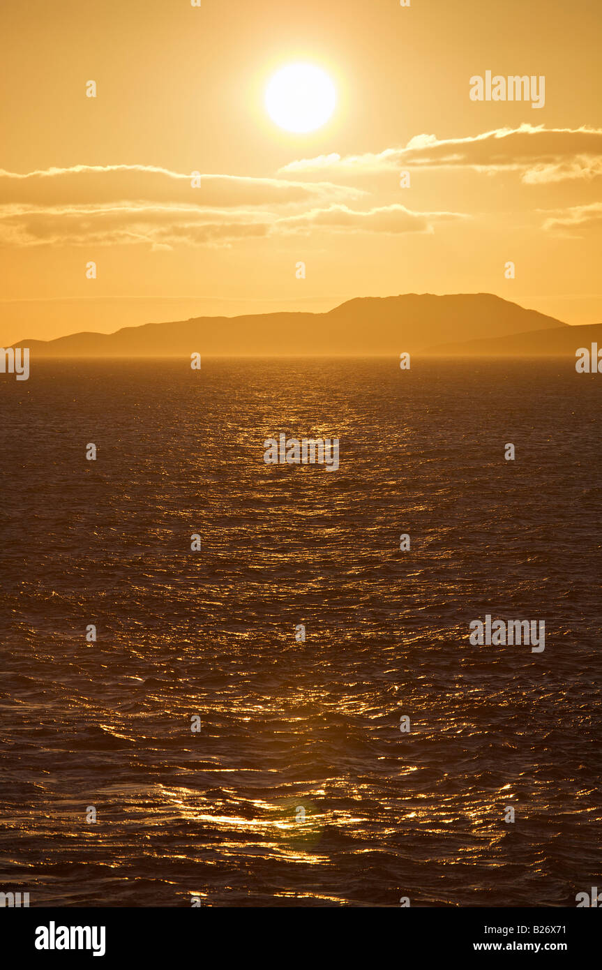 Golden sunset across the North Minch to Lewis and Stornoway Stock Photo ...