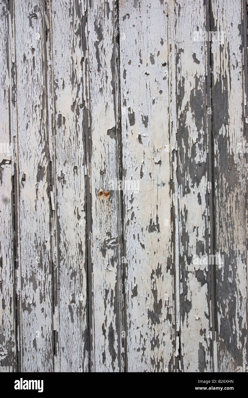 Distressed paintwork on a wooden panel, weathered panel background ...