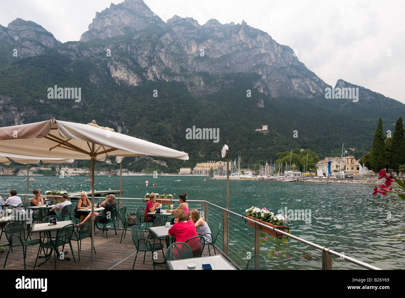 Lakefront cafe, Riva del Garda, Lake Garda, Italy Stock Photo - Alamy
