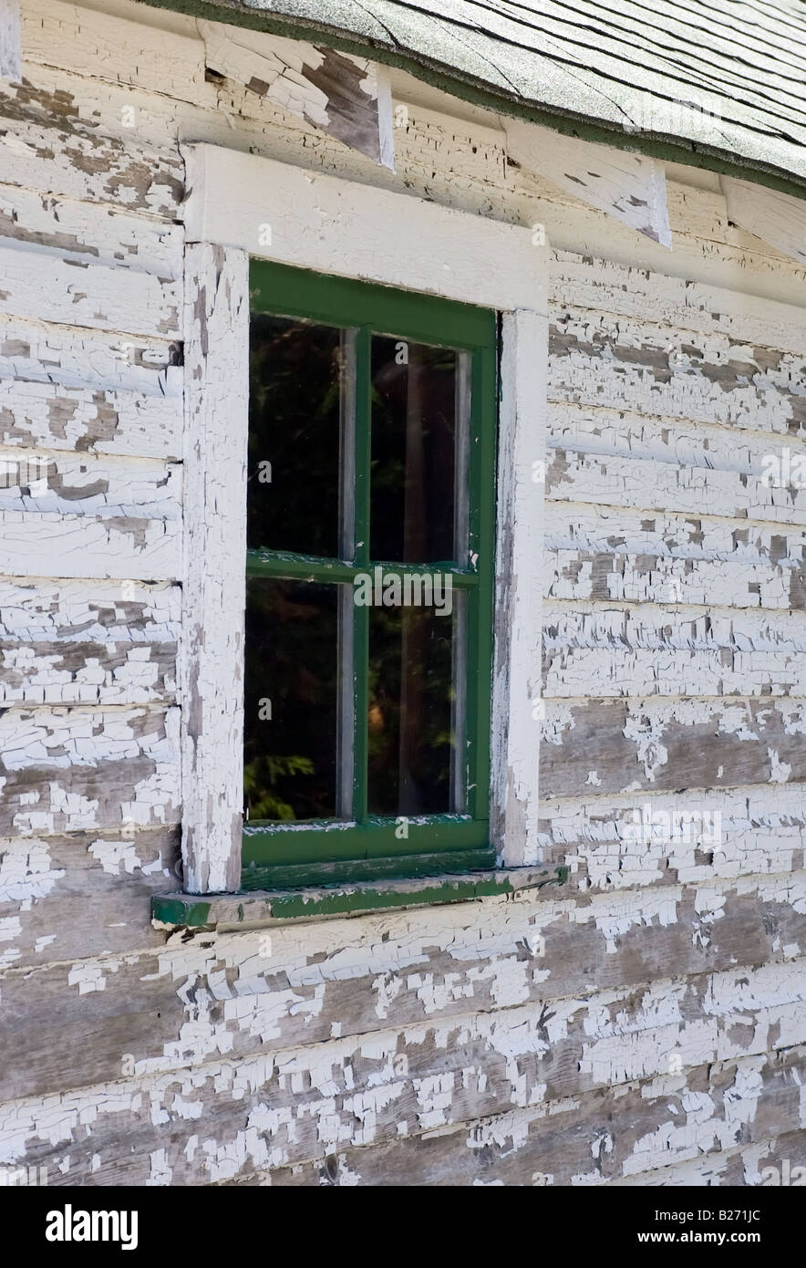 Old outside wall with green window Stock Photo - Alamy