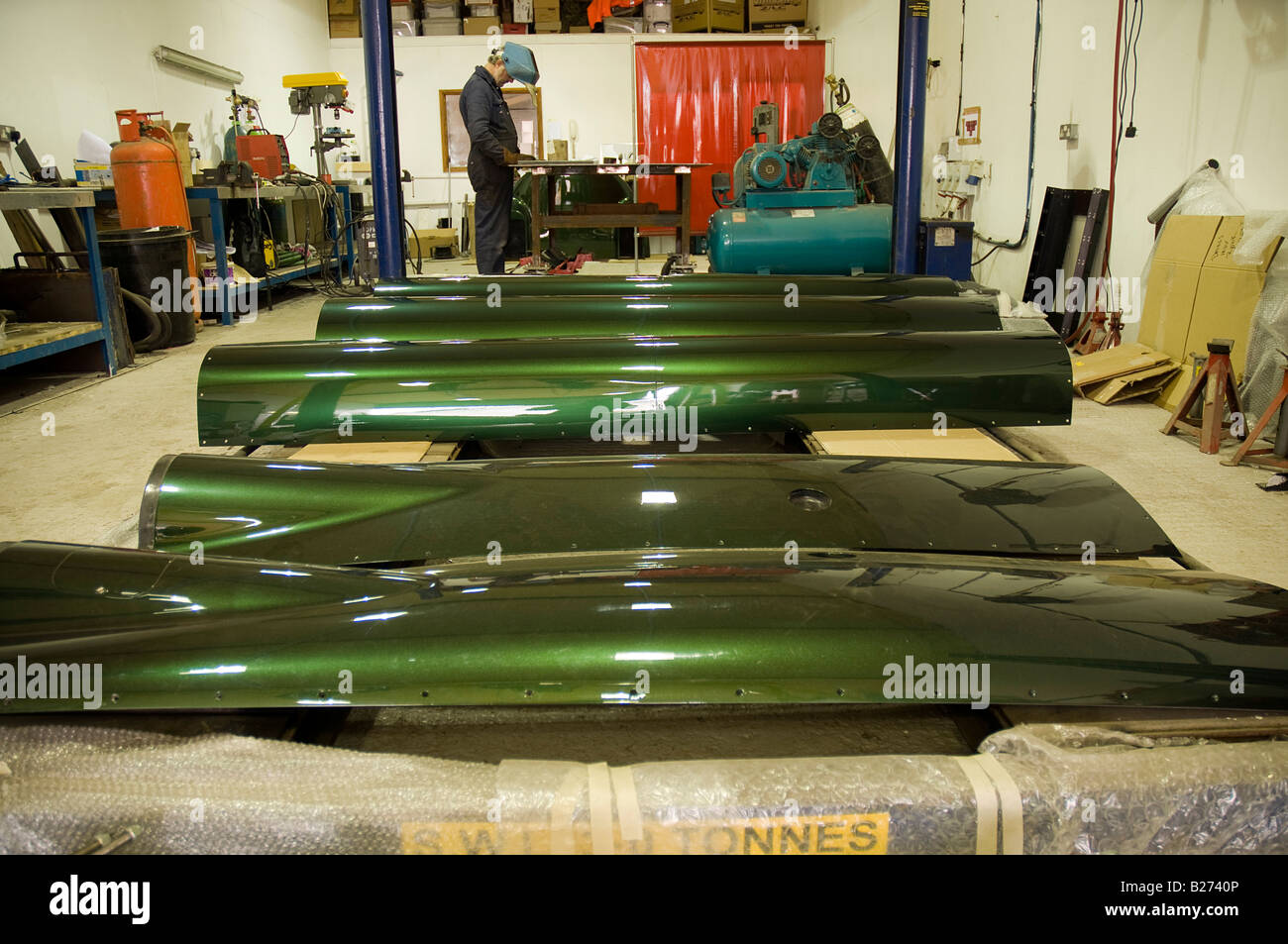 Inspirations body panels laid out in the workshop Stock Photo - Alamy