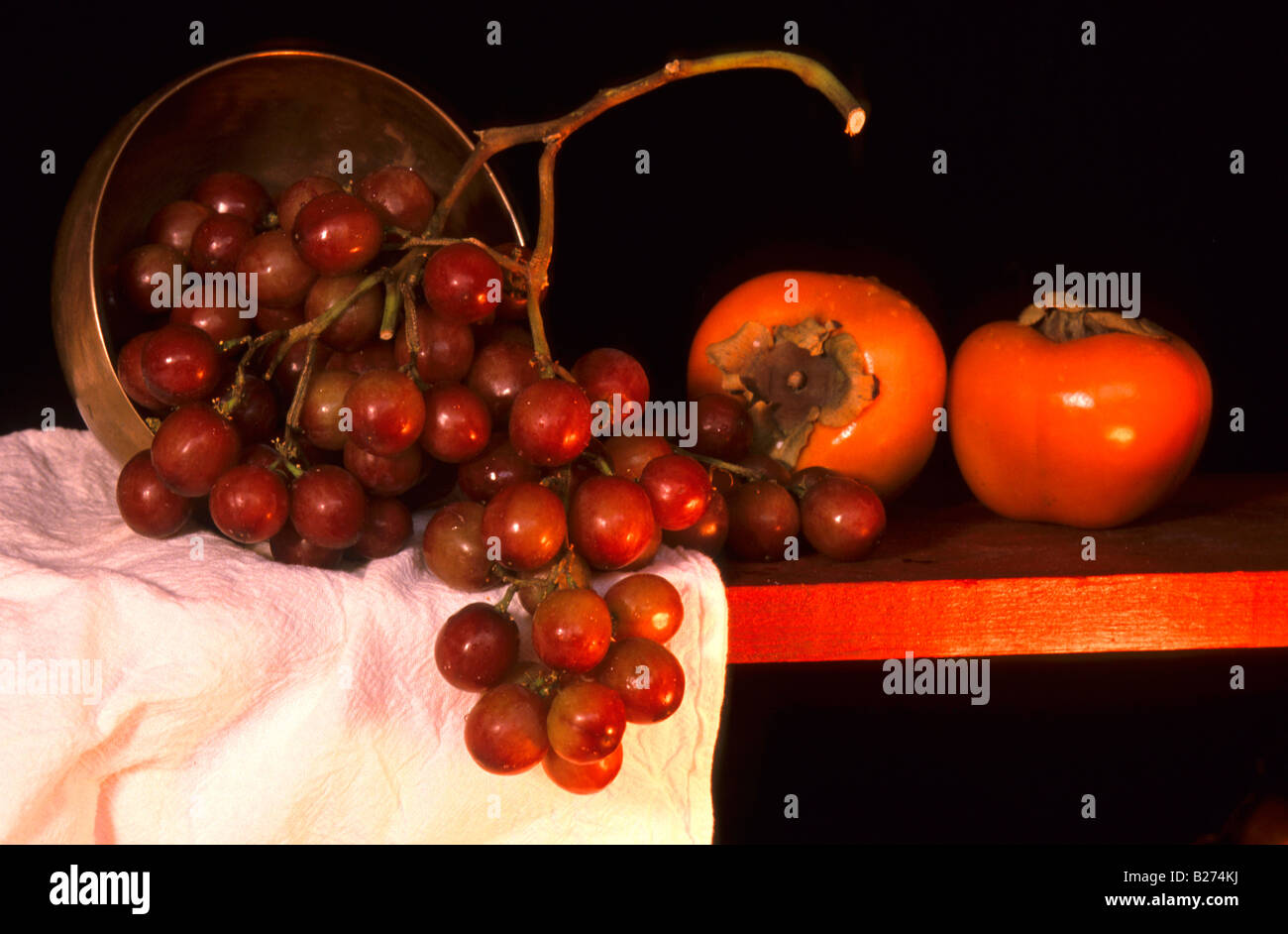STILL LIFE FRUIT GRAPES PERSIMMONS Stock Photo - Alamy