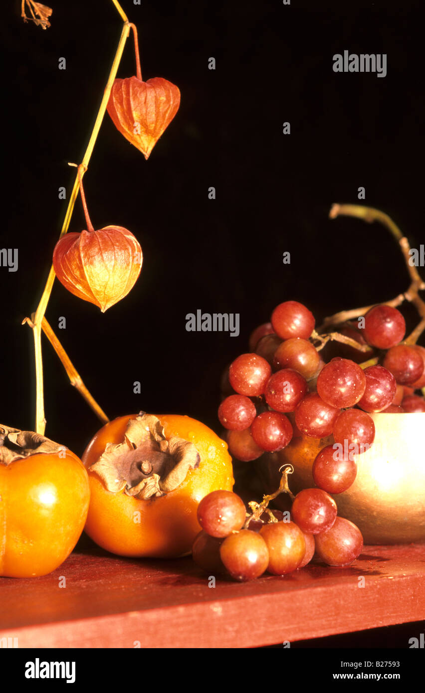 STILL LIFE FRUIT GRAPES PERSIMMON JAPANESE LATERN Stock Photo - Alamy