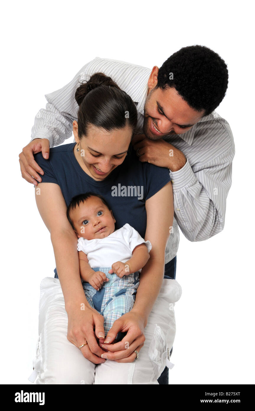 Young family with baby isolated over a white background Stock Photo - Alamy