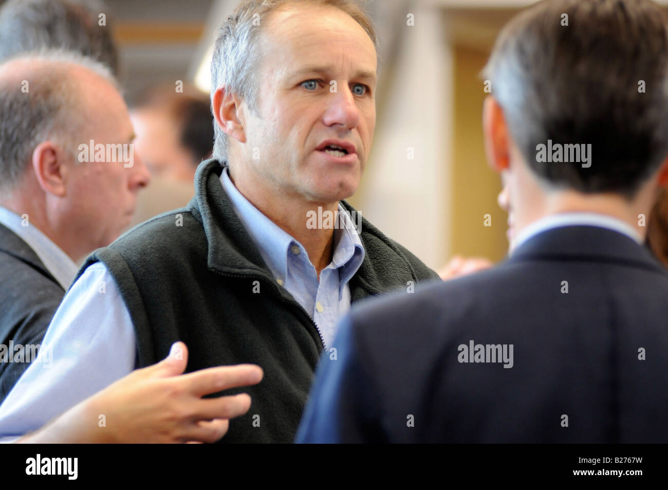 Royalty free photograph of a British business men in meeting talking ...