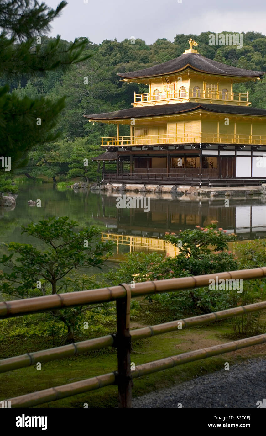 Famous golden pavilion called Kinkakuji Temple in Kyoto reflecting in ...
