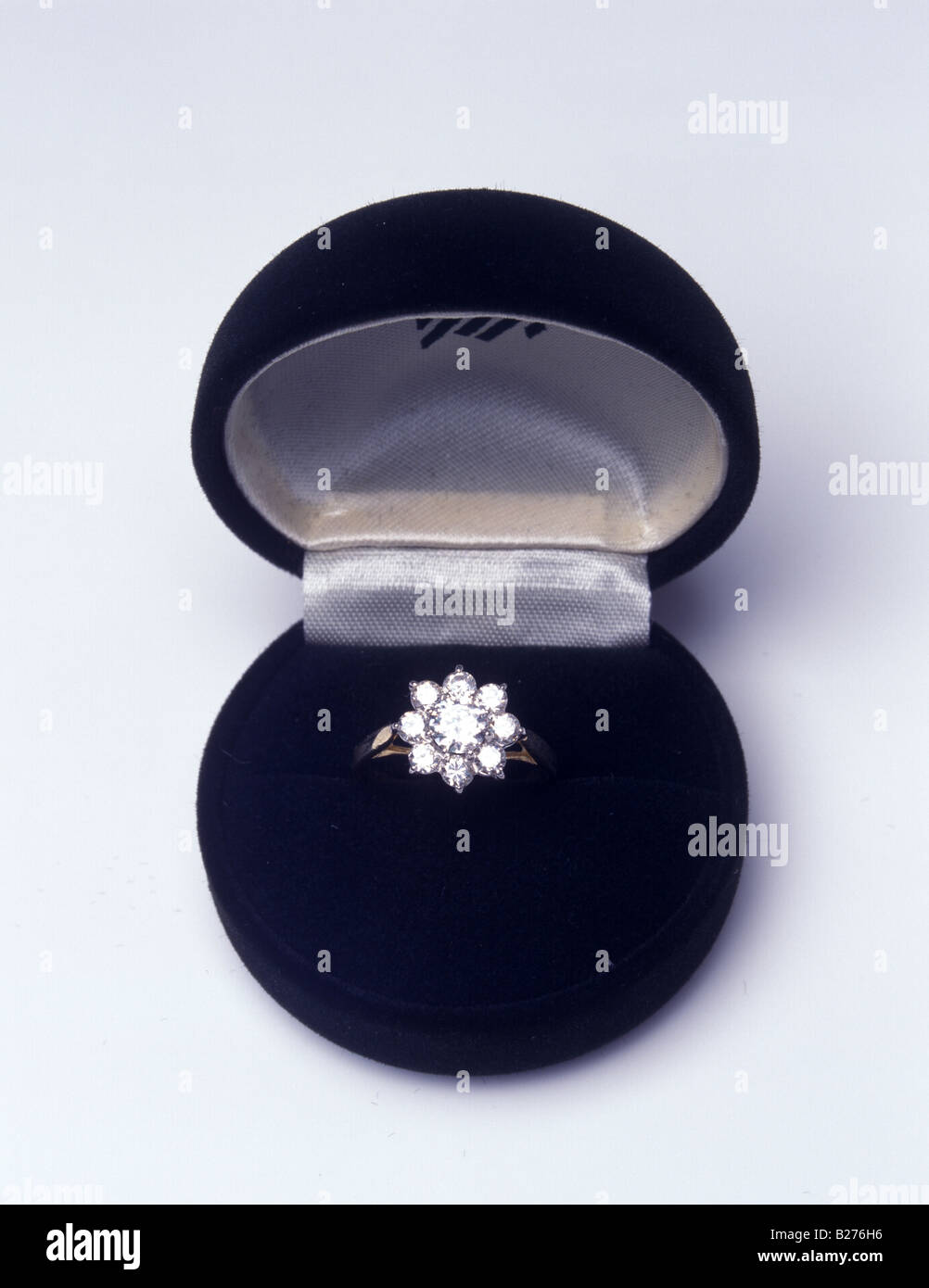 a diamond ring in a display box Stock Photo - Alamy