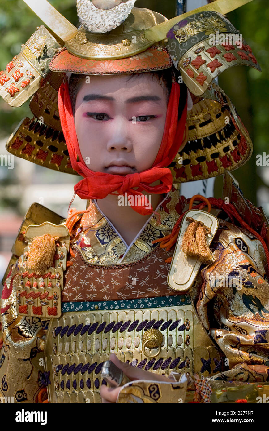 Boy wearing samurai costume participating in the Gion Matsuri Hanagasa ...