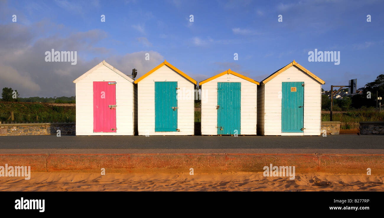 Colourful beach huts in lovely dawn light on the promenade at ...