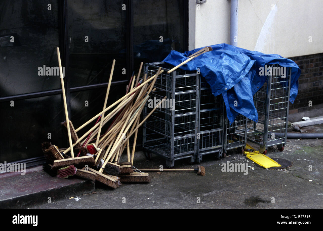 Workmans tools propped against a wall, Southall West London UK Stock ...