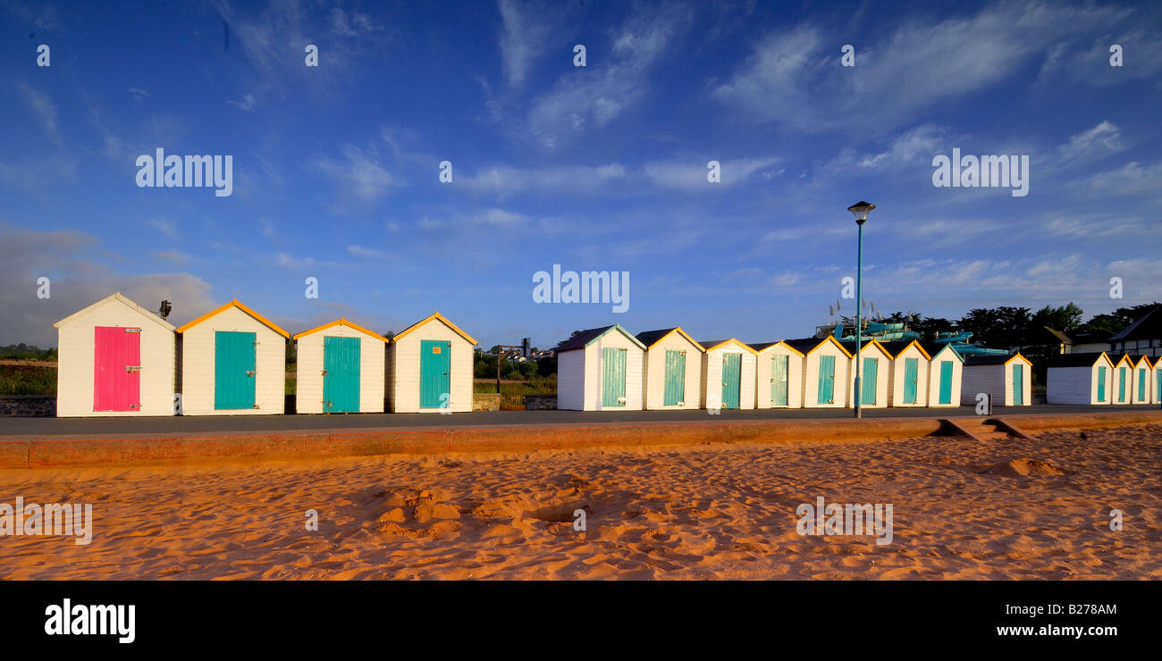 Colourful beach huts in lovely dawn light on the promenade at ...