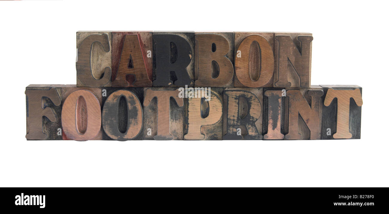 the term 'carbon footprint' in an old, ink-stained Windsor font Stock ...