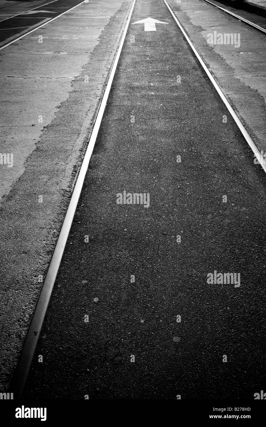 Arrow on the ground pointed in one direction Stock Photo - Alamy