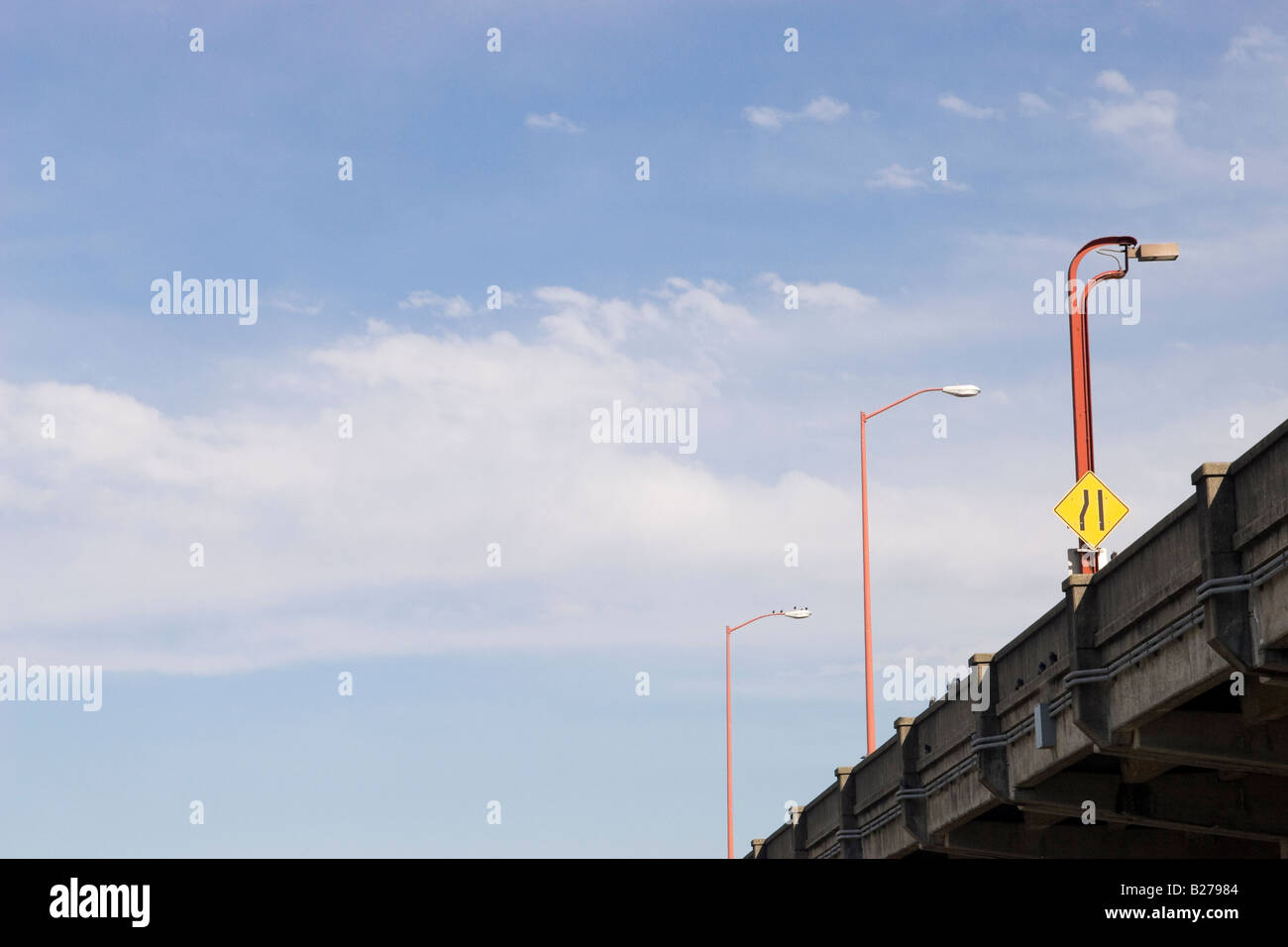 Merging road sign hi-res stock photography and images - Alamy
