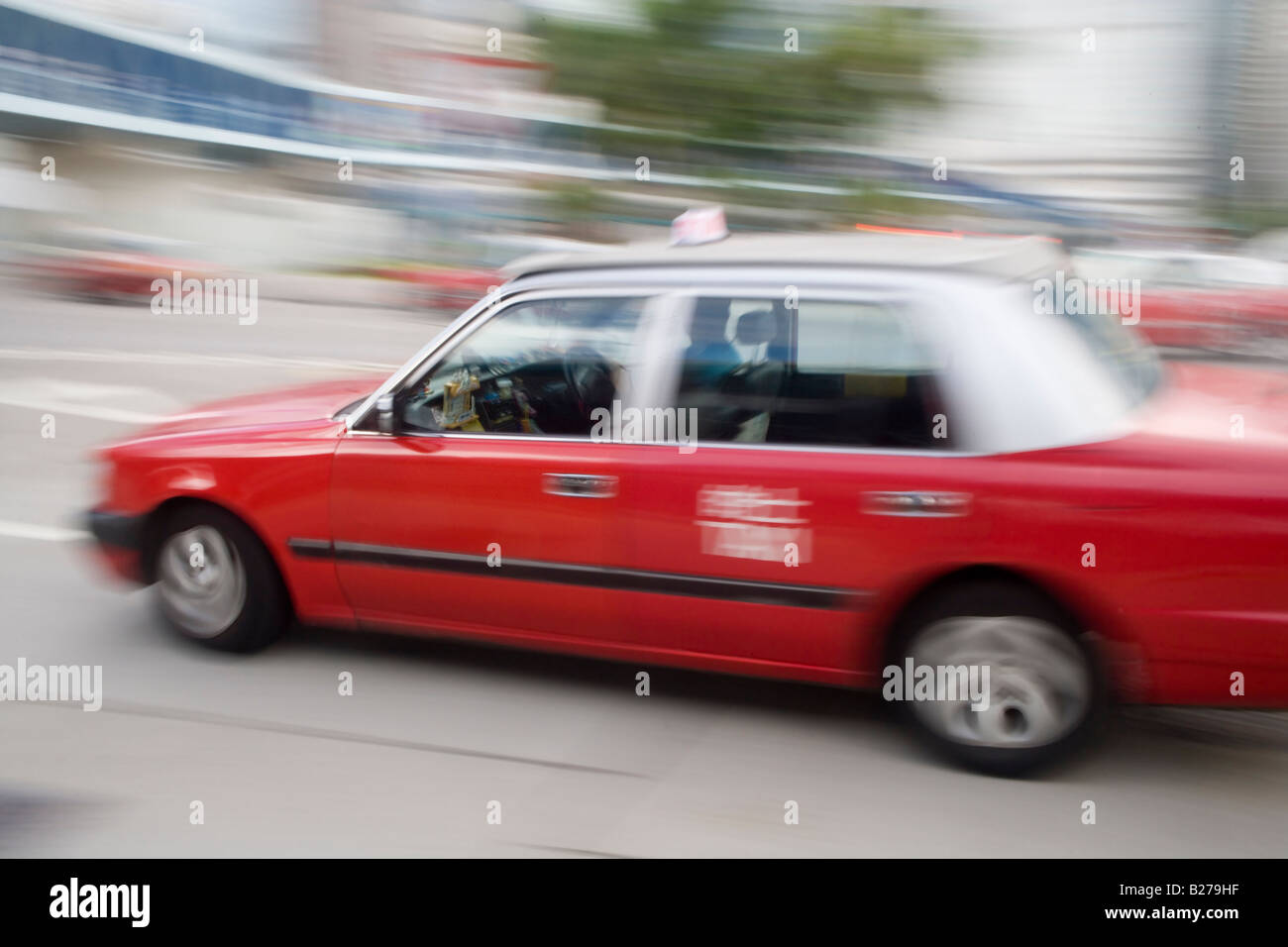 Red taxi Hong Kong Stock Photo - Alamy