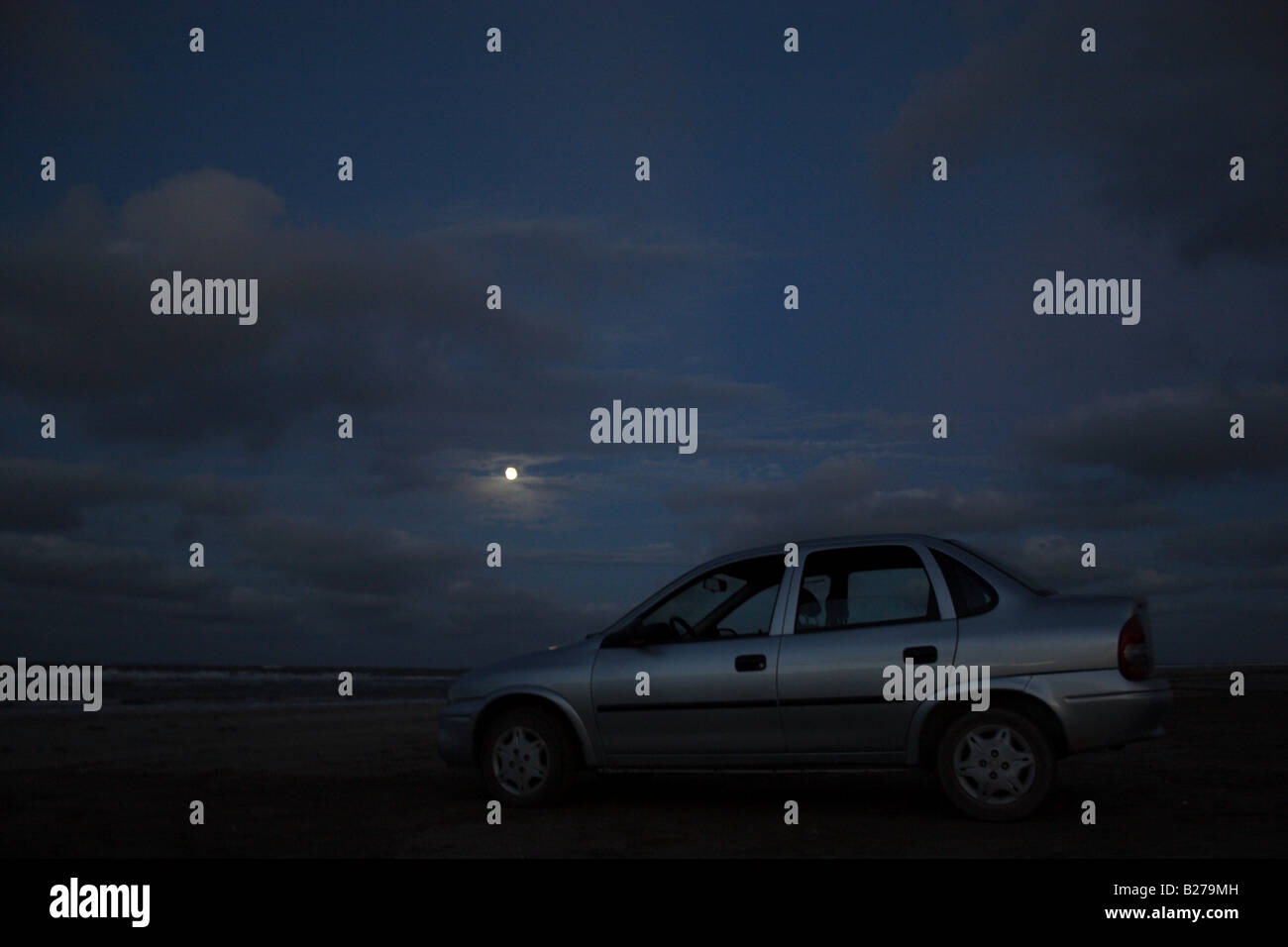 Car & moon on the beach Stock Photo - Alamy