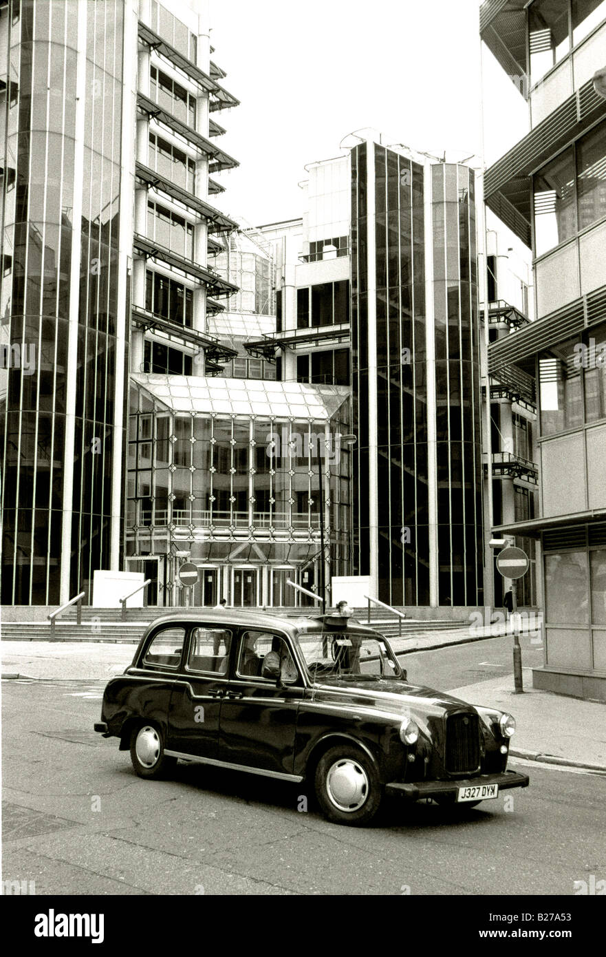 Cab in front on a modern building in the City London Stock Photo - Alamy