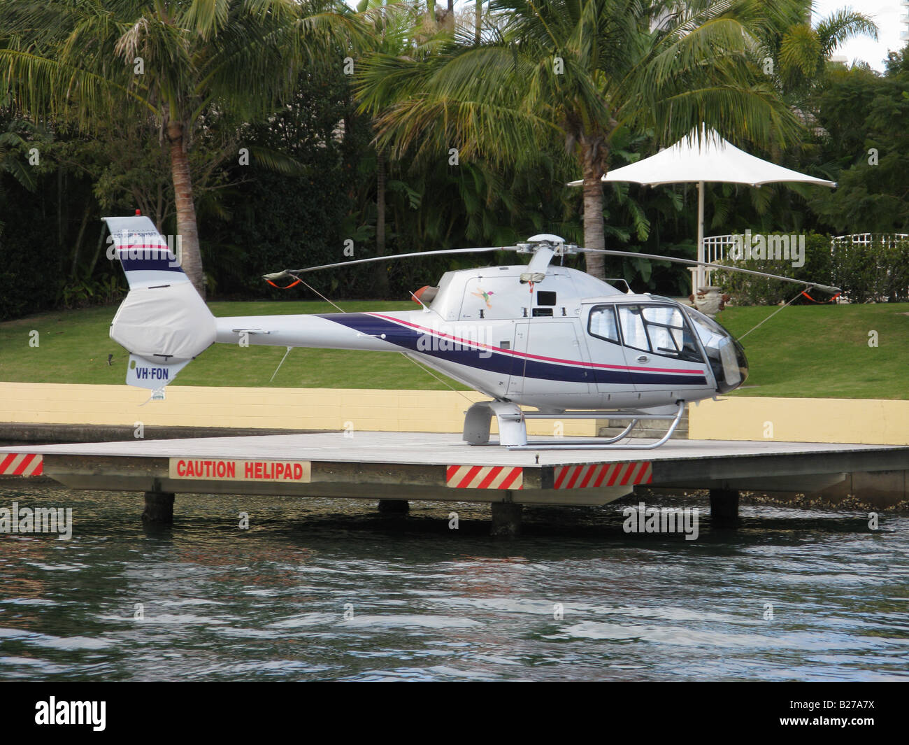 Waterfront house with helicopter parked in front, Surfers Paradise ...