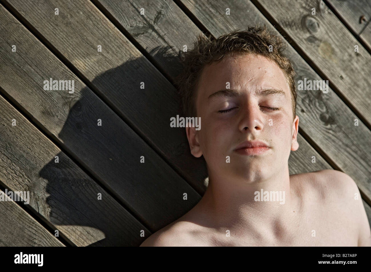 Boy in the sun Stock Photo - Alamy