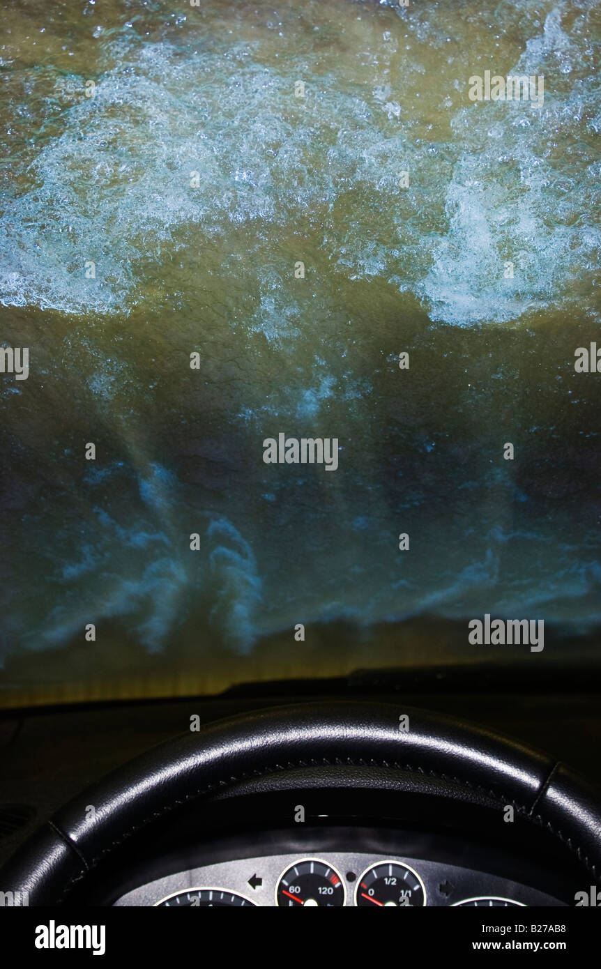 car windshield sprayed with water in a car wash Stock Photo - Alamy